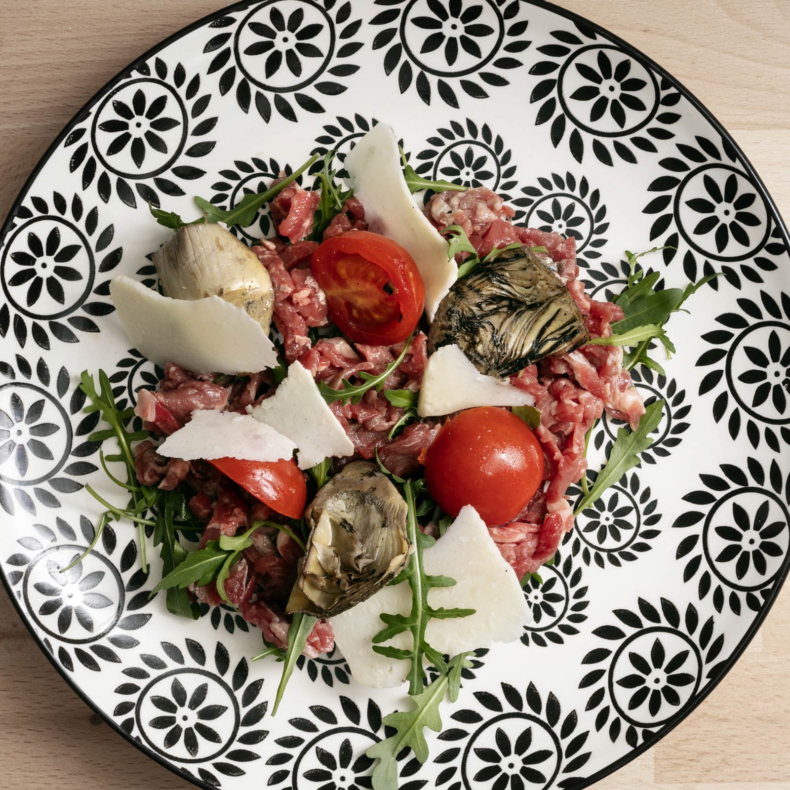 Straccetti con carciofi, rucola, pachino e parmigiano - Chiesa Carni